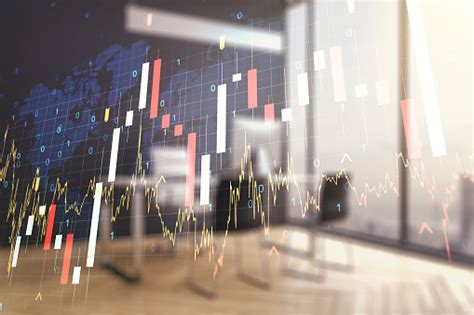 세계지도와 배경 외환 및 투자 개념에 컴퓨터가있는 현대 데스크톱과 추상적 인 창조적 인 재무 그래프의 다중 노출 0명에 대한