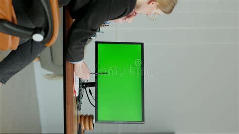 Woman Working On Desktop Computer With Green Screen Mock Up In Modern Office Stock Video Video