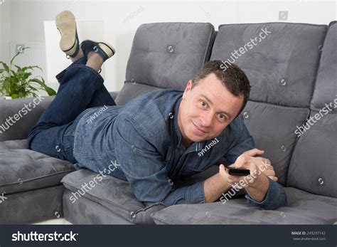 Happy Man Lying On Couch Stock Photo Shutterstock