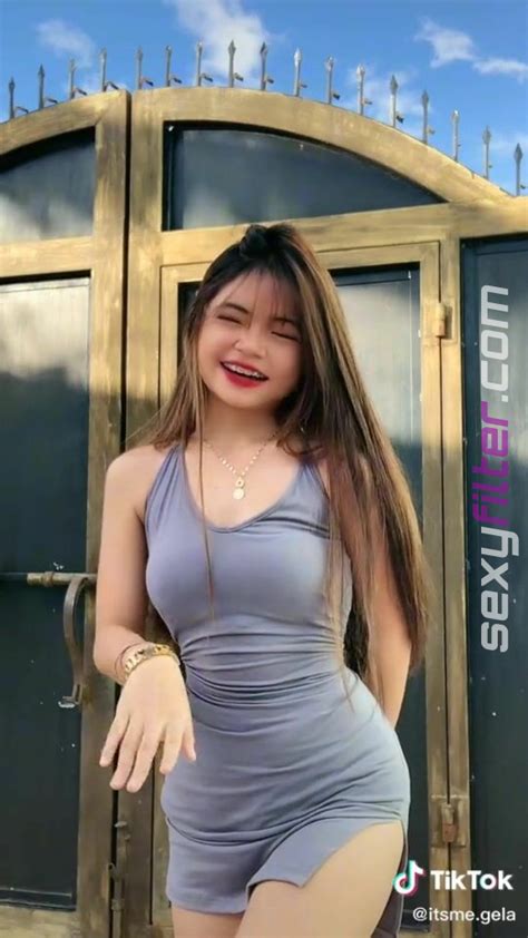 Sexy Angela Mae Evangelista Shows Cleavage In Grey Dress