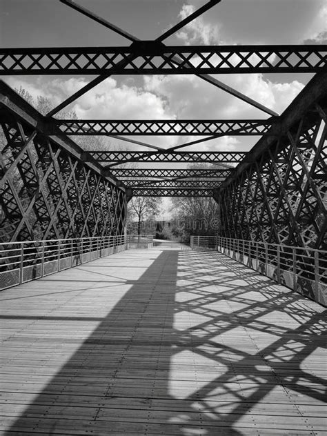 View Of A Pedestrian Bridge With A Game Of Light And Shadows Of The