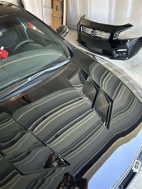 7thgen Nissan Maxima with Custom Vented Hoods