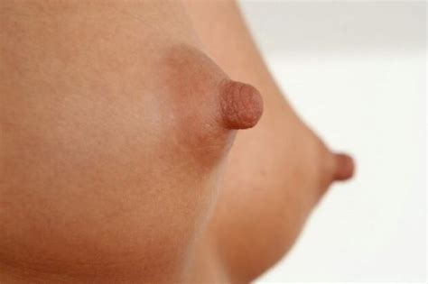Closeup Imsge Of Beautiful Tits With Erect Spankthebutcher