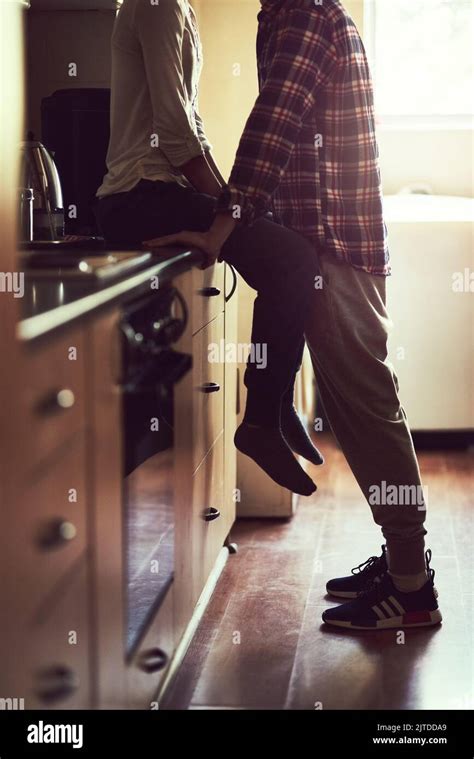 Things Are Heating Up In The Kitchen Young Couple Sharing A Romantic