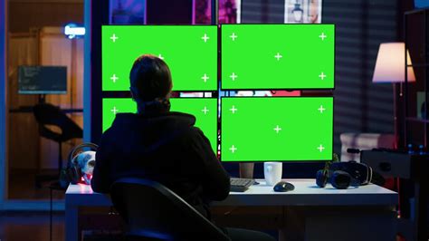 Premium Stock Video Cybercriminal Coding On Green Screen Monitors Developing Zero Day Exploit