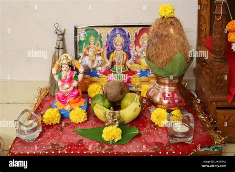 Traditional Setup Of Diwali Pooja Of Laxmi Sarswati And Ganesh On
