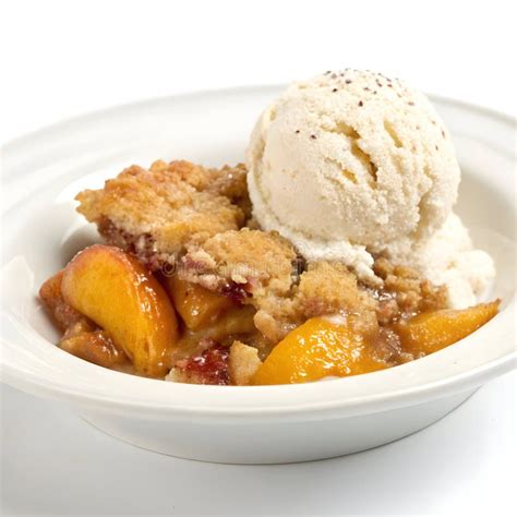 Peach Cobbler With Vanilla Bean Ice Cream Isolated On White Stock