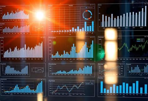 Many Charts And Graphs Reflection Light And Flare Concept Image Of Data