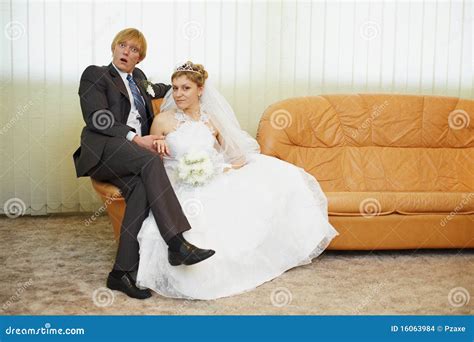 Amusing Groom And Bride Sitting On Armchair Stock Photo Image Of Handsome Dress