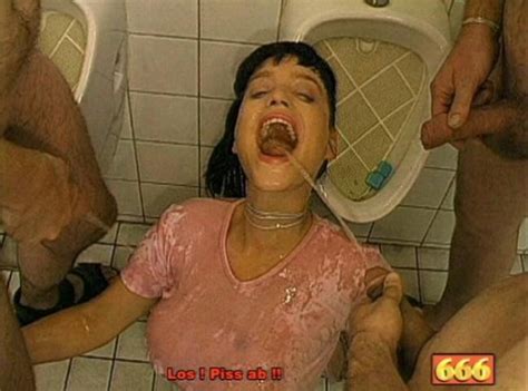 Young Hot Slut Plays Piss And Cum On Her Mouth During Extreme Bukkake