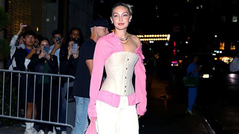 Gigi Hadids Corset And Pink Shirt At Launch Party Photos Hollywood Life