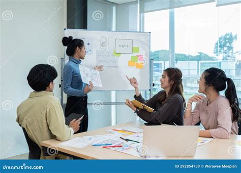 Team Of Ux Developer And Ui Designer Brainstorming Interface Wireframe Design Creative Digital