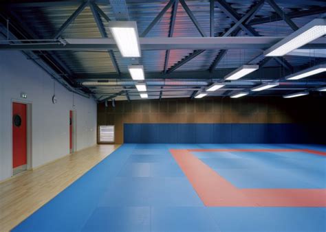 Sports Complex By Archi5 And Tecnova Architecture With A Basalt Facade