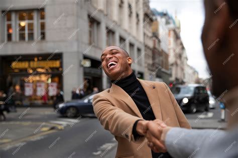 Free Photo Gay Couple Being Affectionate And Acting Goofy On A City