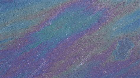 Oil Patterns On Pavement Stock Video Clip K0117215 Science Photo