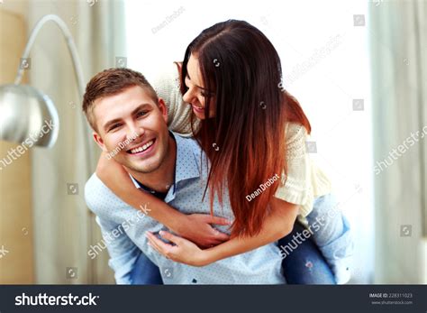 Happy Man Holding His Wife On Stock Photo Shutterstock
