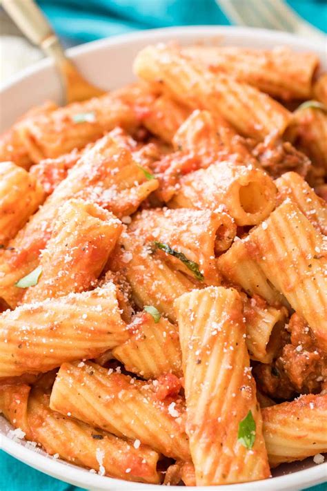 Close Up View Of Rigatoni In Large White Bowl