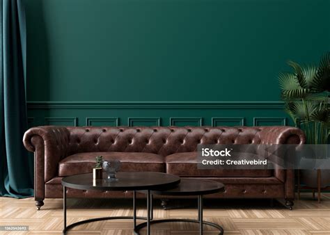 현대적인 거실에 빈 녹색 벽 클래식 한 스타일로 인테리어를 모의 여유 공간 사진 텍스트 또는 다른 디자인의 공간을 복사합니다 갈색 가죽 소파 식물 쪽모이 세공 바닥 3d