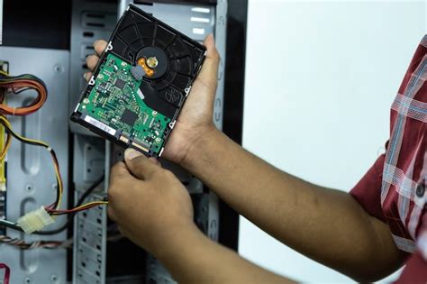 Premium Photo Asian Man Computer Technician Screwdriver Computer Motherboard Repair Safety