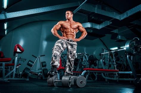 Premium Photo Handsome Young Muscular Men At The Gym