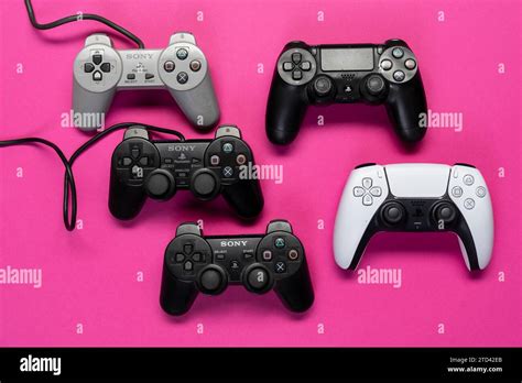 Different Generations Of Game Controllers Of The Playstation Game