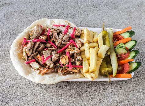 Premium Photo Chicken Shawarma Platter With French Fries And Salad