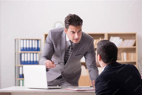 Premium Photo Angry Boss Shouting At His Employee