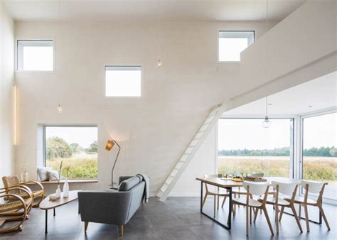 Alireza Razavis House For A Photographer Has Slanted Volumes