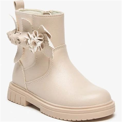 خرید و قیمت چکمه‌های مچ‌دار دخترانه با گل‌های تزئینی و زیپ بسته‌شونده و