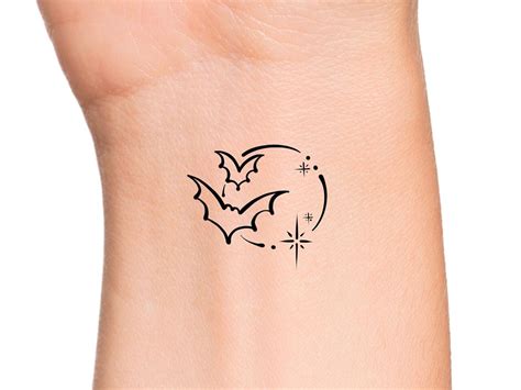 Tiny Bat Tattoos