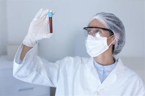 Premium Photo Caucasian Female Healthcare Worker Wearing A Lab Coat