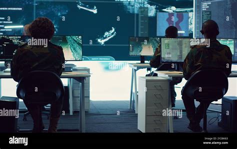 Military Crew Working In Reconnaissance Control Tower Power Base Monitoring Air And Sea Traffic