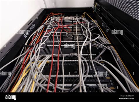 Low Angle Shot Of Network Switch Full Of Ethernet Cables In Server Room Stock Photo Alamy