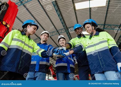 Successful Engineer Automation Robot Technician Joining Hand Teamwork