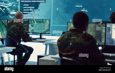 Group Of Soldiers Managing Air And Sea Traffic Control For Military Operations Success Working