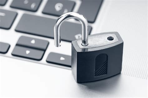 Premium Photo Open Padlock On Modern Laptop Computer Security Vulnerability Concept
