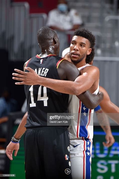 Thon Maker Of The Cleveland Cavaliers Hugs Tony Bradley Of The News