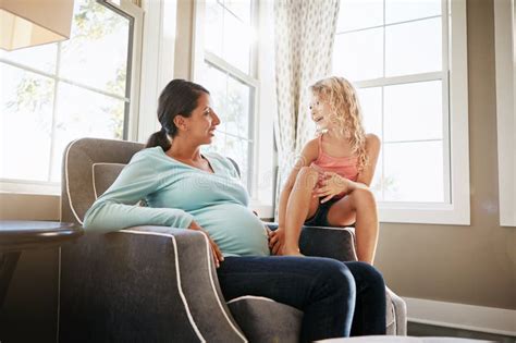 Shes Excited About Being A Big Sister A Pregnant Woman Spending Time