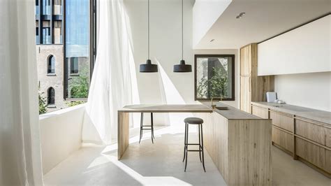 Arjaan De Feyter Combines Light And Warm Materials In Converted