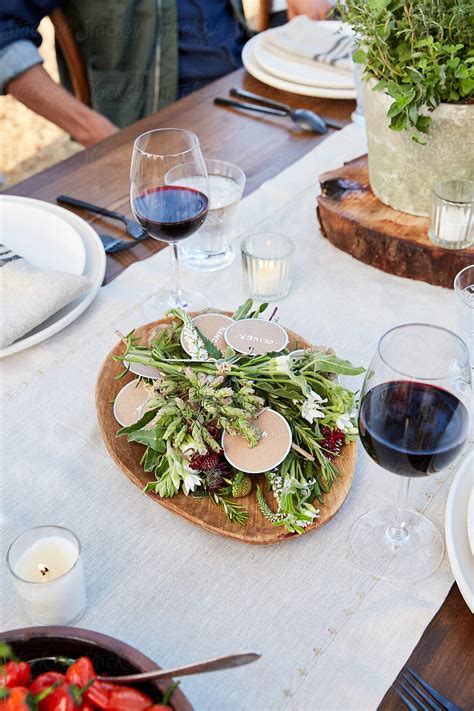 name tags for place settings at farm to table dinner party by stocksy