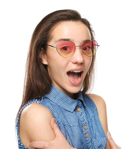 Premium Photo Beautiful Young Woman With Heartshaped Glasses On White