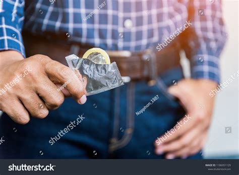 Male Hand Holding Condom Safe Sex Stock Photo Shutterstock