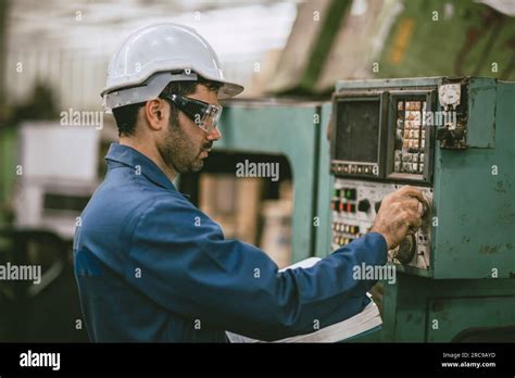 Hispanic Latin Indian Male Worker Working Control Operate Lathe Cnc
