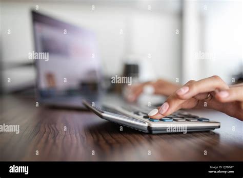 Budget Calculator Hand Hi Res Stock Photography And Images Alamy