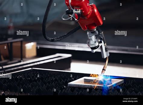 Closeup Robot Arm Metal Argon Welding Machine Working Robotic Technology In Precious Automation