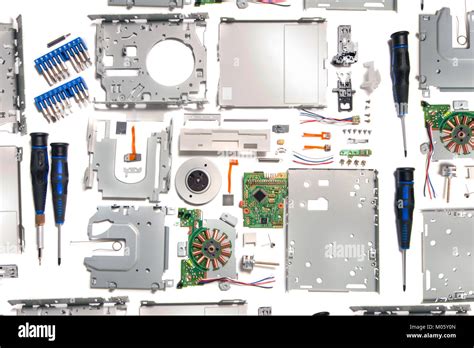 Disassembled Floppy Disk Drive Parts Isolated On A White Background