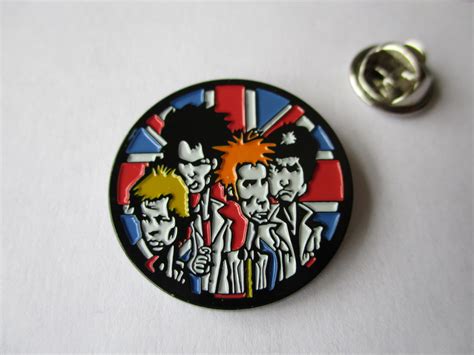 Sex Pistols Embossed Punk Metal Badge Savage Amusement