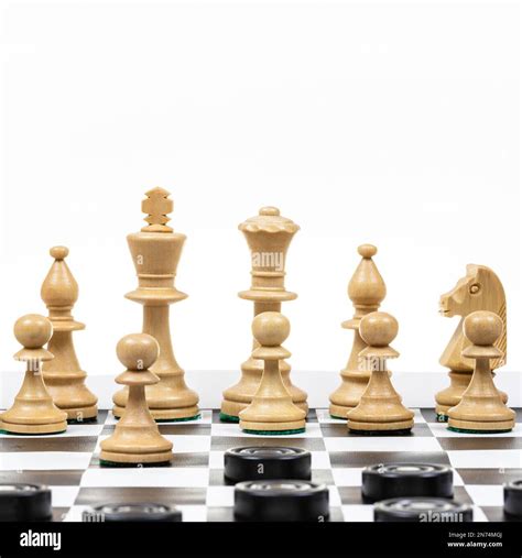 playing by different rules on the same board black checkers and white chess figures on black