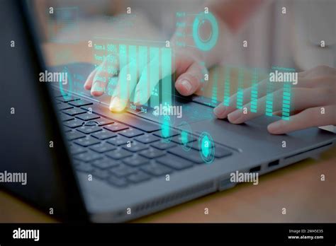 Woman Using Laptop Analyzing And Development At Various Information On Futuristic Virtual