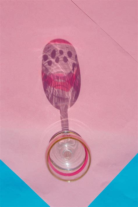 Free Picture Crystal Wine Glass With A Shadow On Pinkish Surface